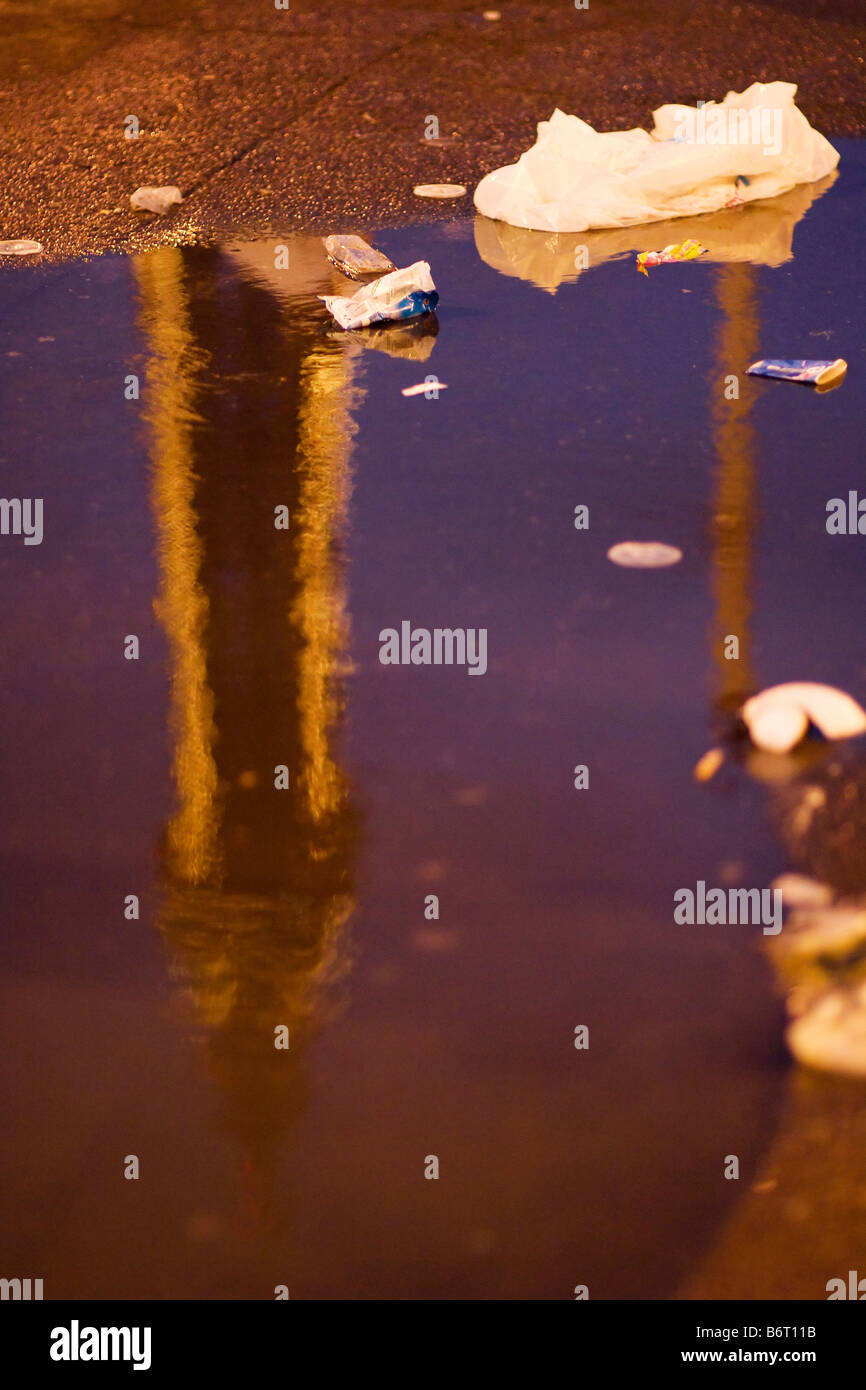 Blackpool Tower reflections and street litter at dusk Stock Photo - Alamy