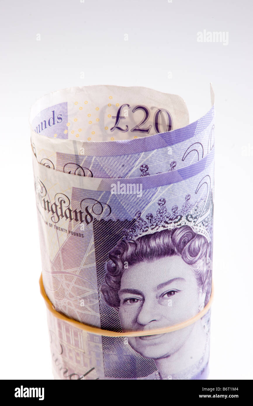 Roll of twenty pound notes Stock Photo - Alamy