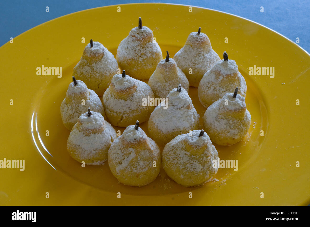 A platter of Amigthalota Greek pastries in the shape of little almond ...