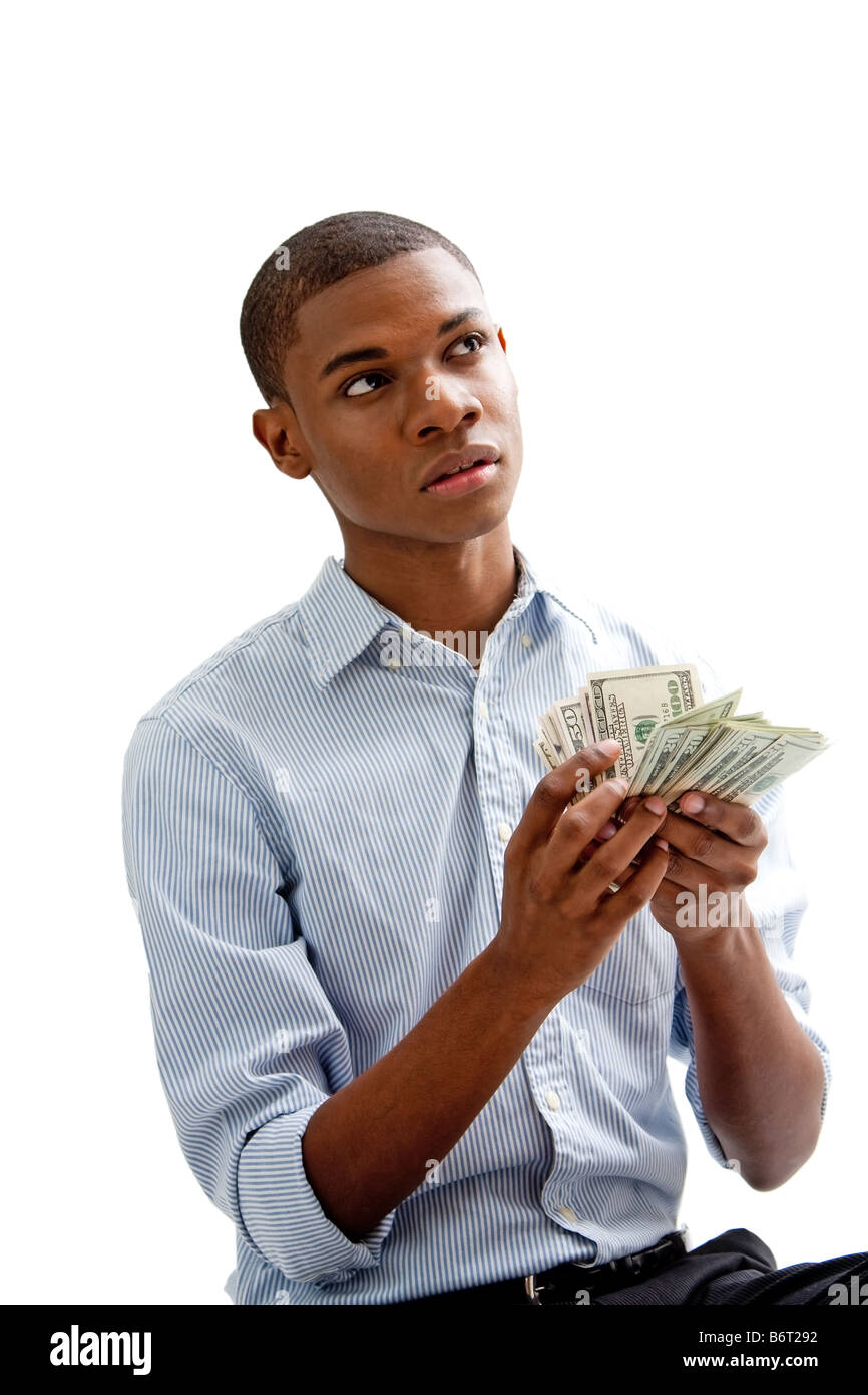 African man holding and counting money isolated Stock Photo - Alamy