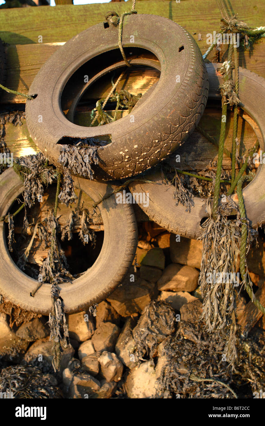 Old rubber tyres being used as mooring protection for boats and ships ...