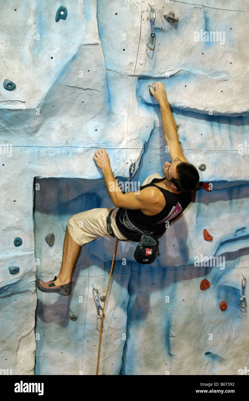 Climber Training on Artificial Indoor Climbing Wall Stock Photo - Alamy