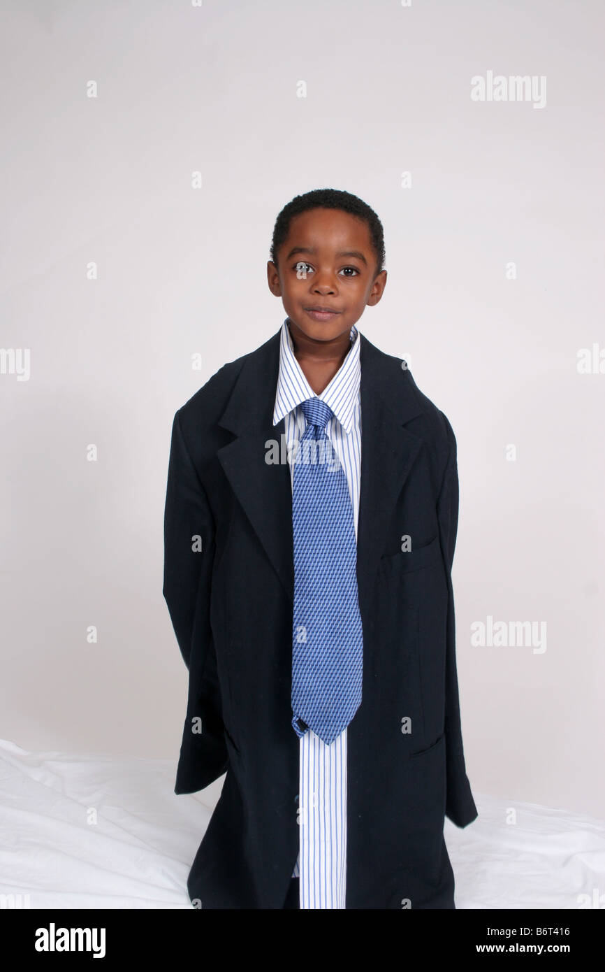 Young boy dressed up like a businessman Stock Photo - Alamy