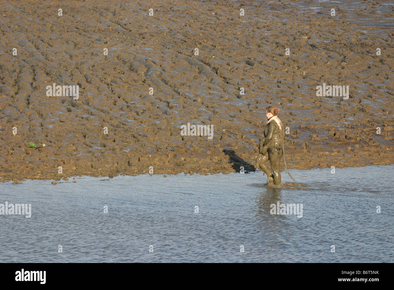 A competitor in the Mad Maldon Mud Race Stock Photo - Alamy