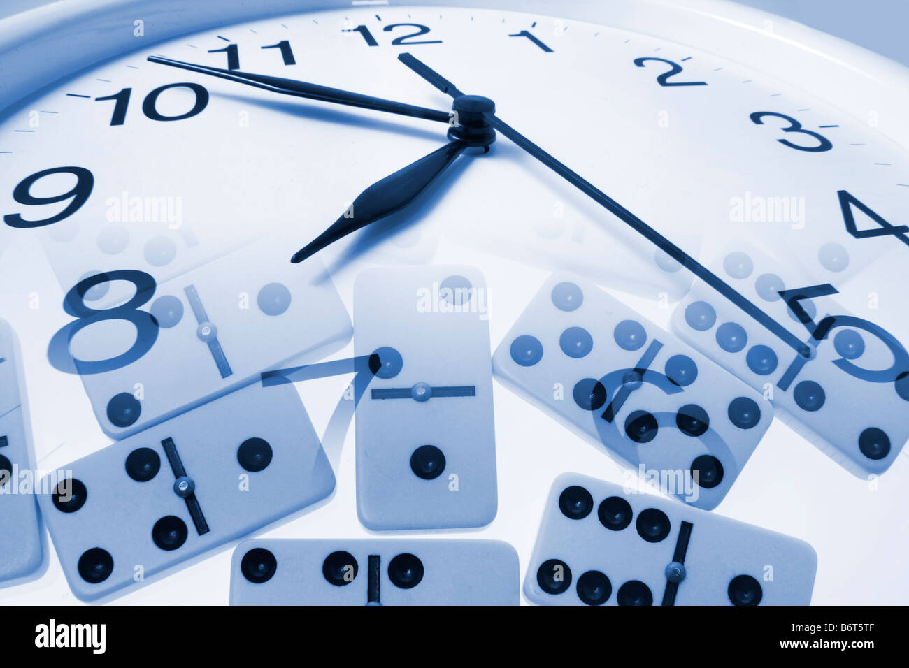 Clock and Dominoes Stock Photo - Alamy