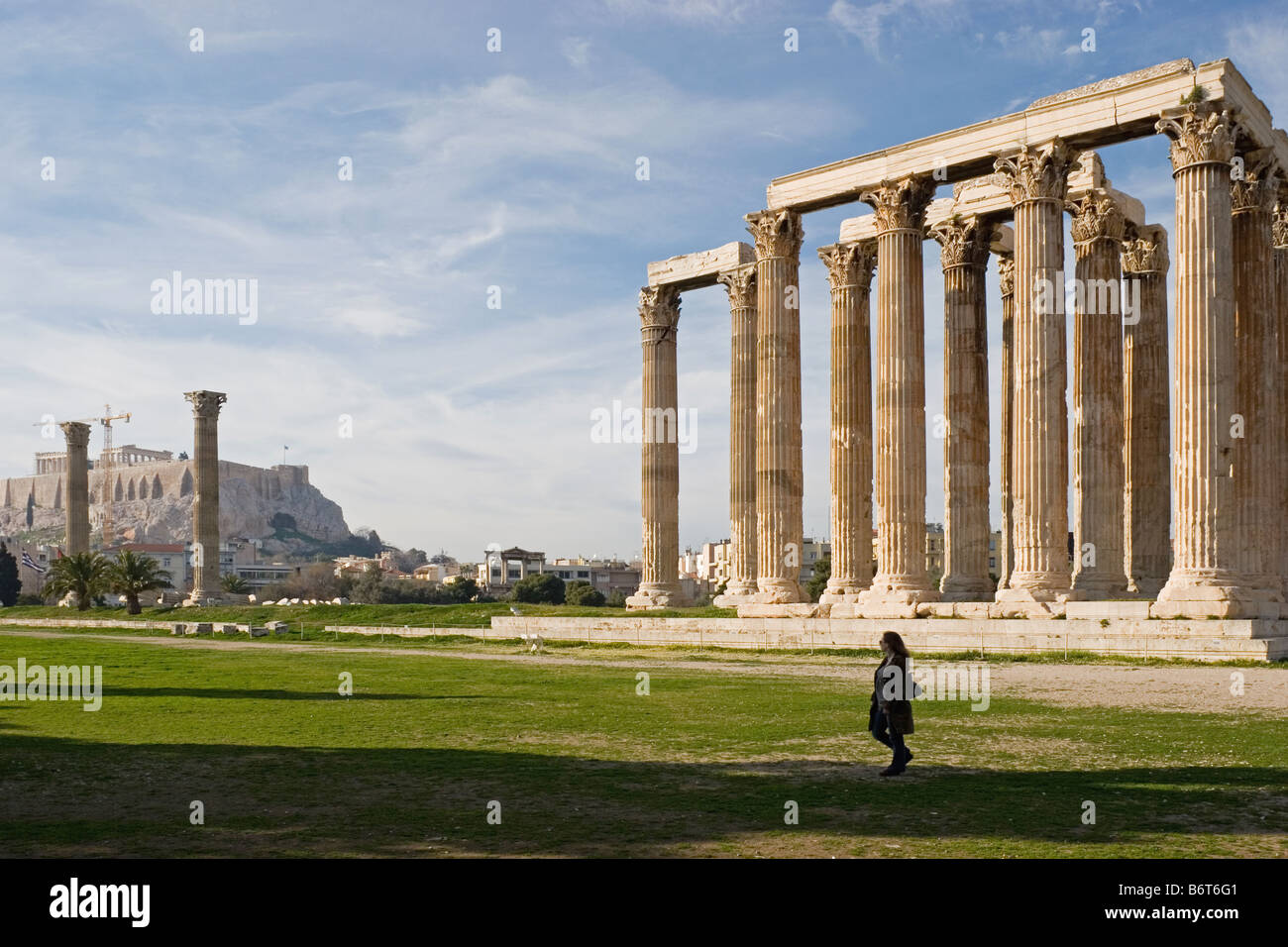 The temple of Olympian Zeus (Olympieion) in Athens, Greece, and the Acropolis in the background ...