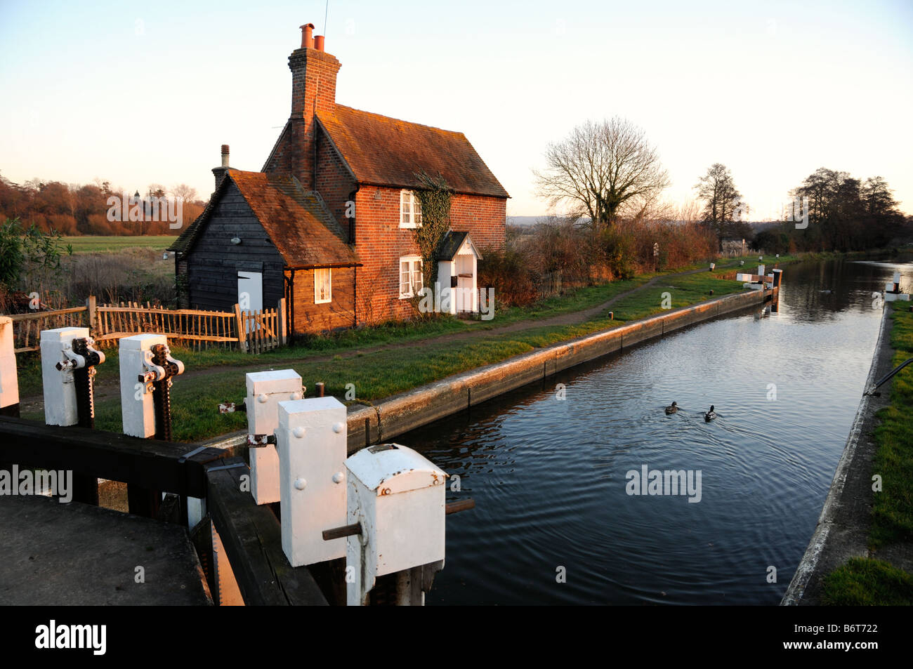 Triggs Lock on the River Wey Navigation in Surrey at dusk in December ...