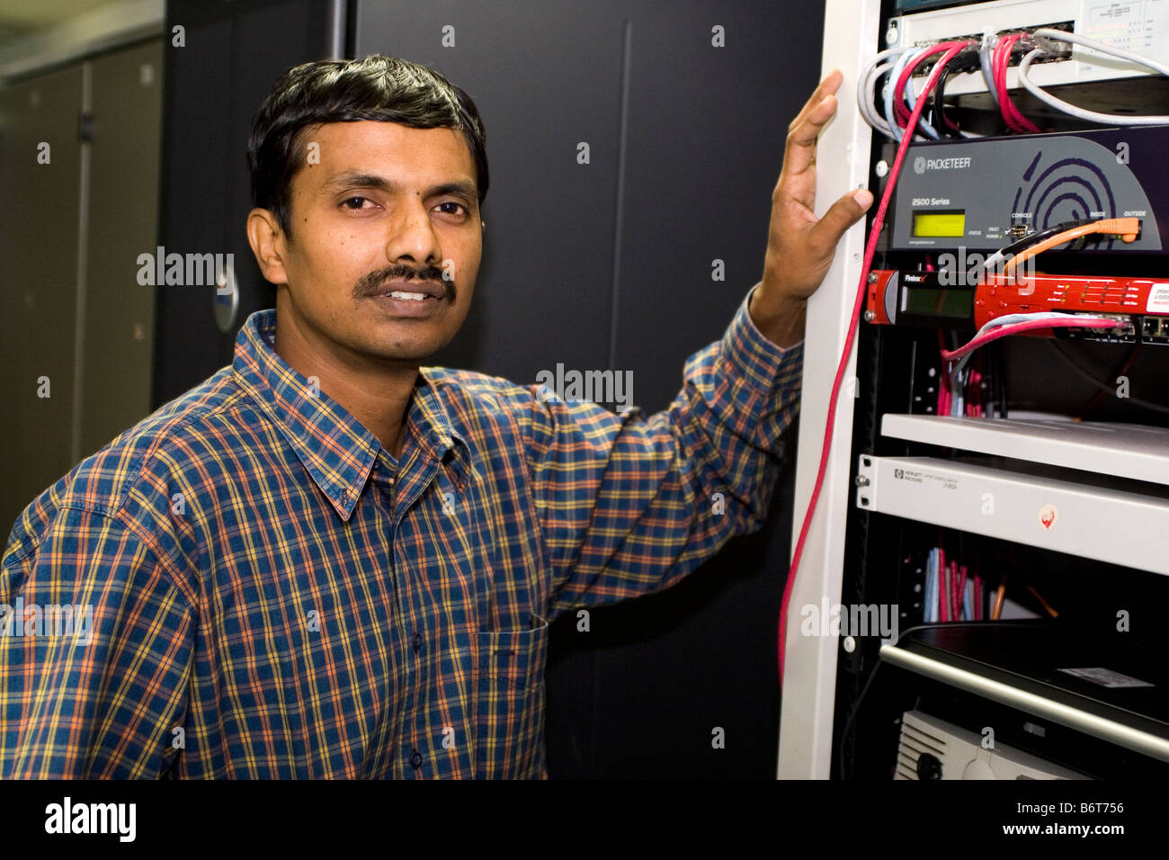 A Indian manager in multinational Information Technology (IT) company ...