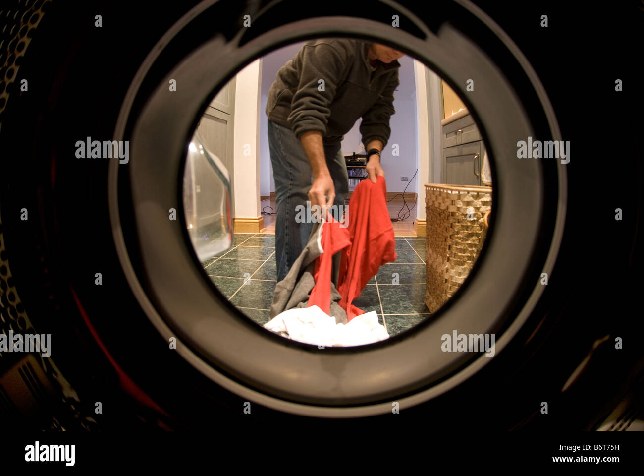 Wash washing machine clothes view from inside drum tumble person hi-res ...