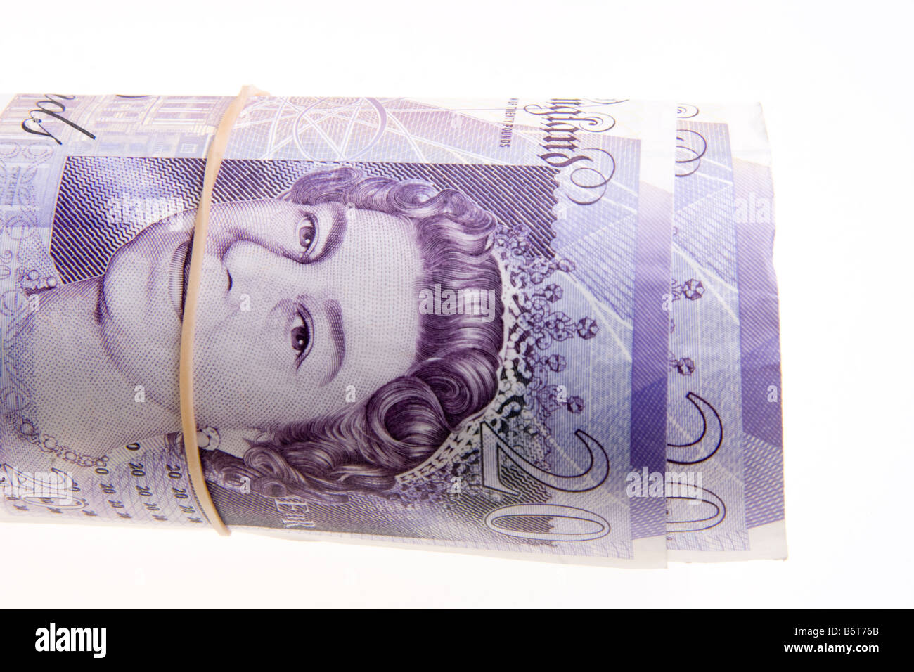 Roll of twenty pound notes hi-res stock photography and images - Alamy
