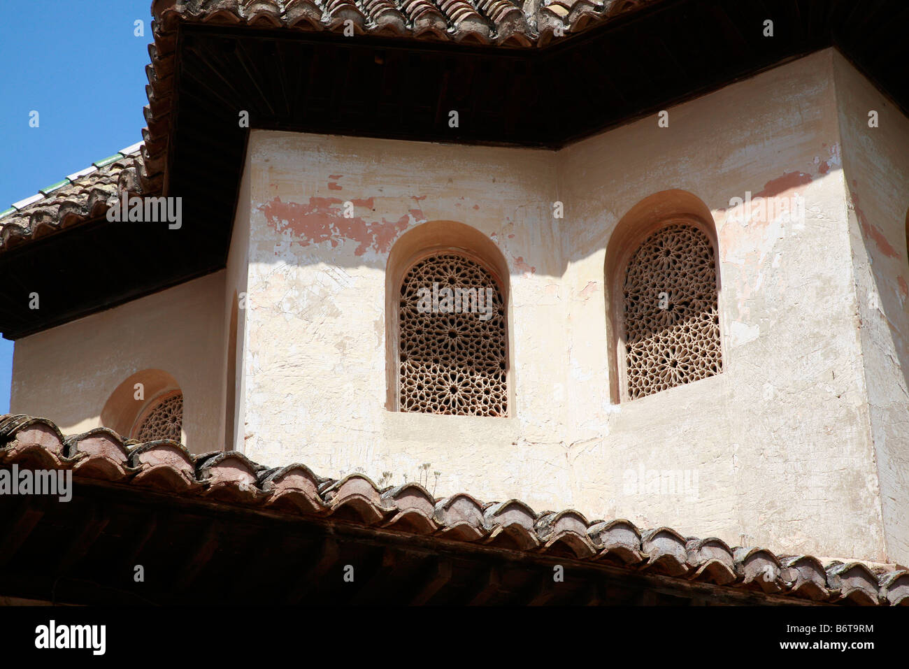 Decorative Moorish windows at the Alhambra Granada, Spain Stock Photo ...