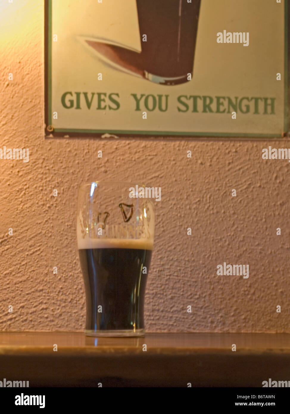 Guinness glass on table hi-res stock photography and images - Alamy