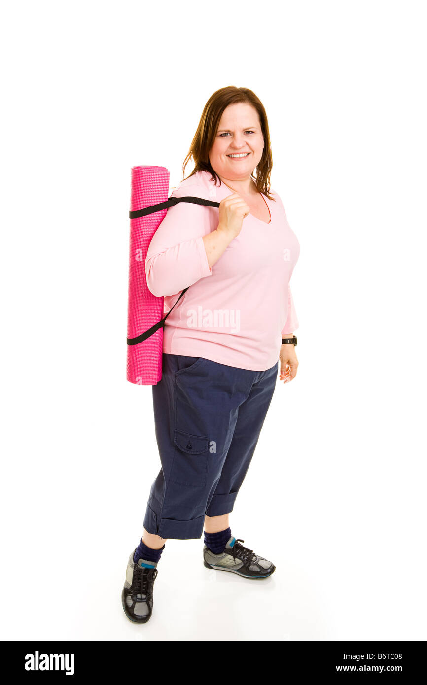 Beautiful plus sized model with her yoga mat ready for a workout Stock ...