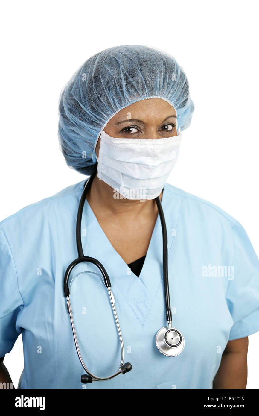 A portrait of a doctor in surgical scrubs White background Stock Photo ...