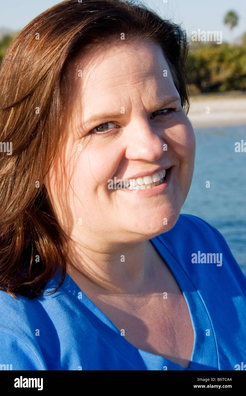 Closeup portrait of a beautiful plus sized model outdoors Stock Photo ...