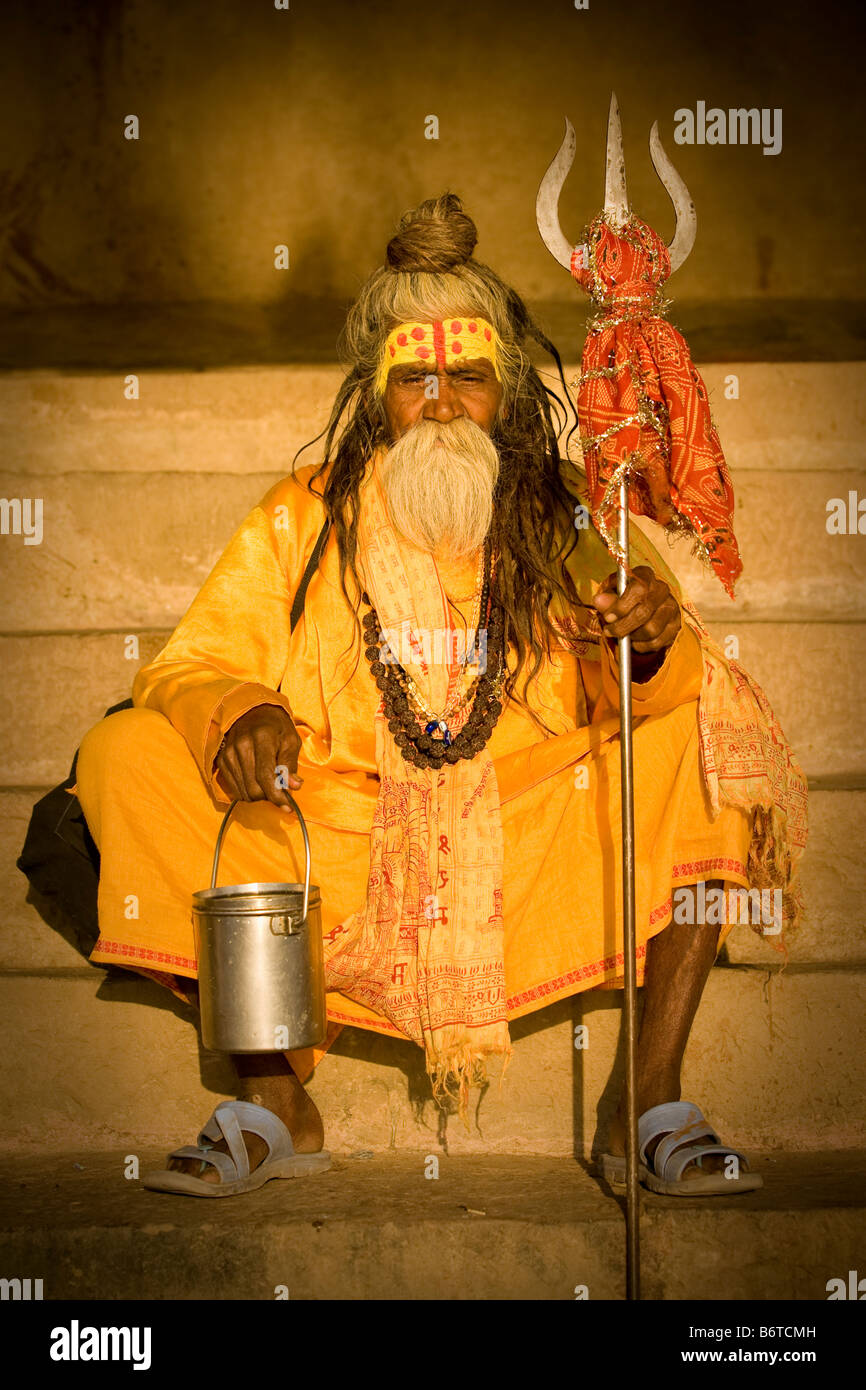 Portrait of Sadhu sitting on the ghats in Varanassi, India Stock Photo ...