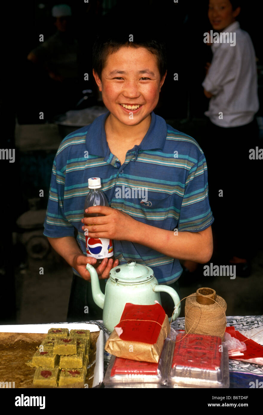 1, one, Chinese boy, Chinese, boy, vendor, selling sweets, market, eye ...