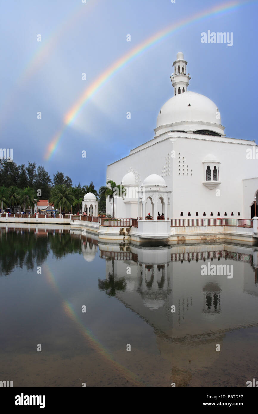 Rainbow over Tengku Tengah Zaharah Mosque in Terengganu, Malaysia, also ...