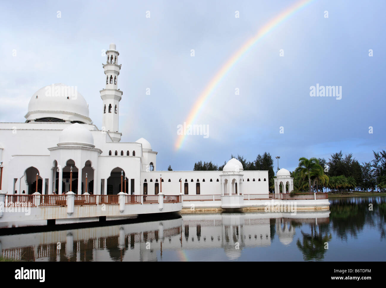 Rainbow and Tengku Tengah Zaharah Mosque in Terengganu, Malaysia, also ...