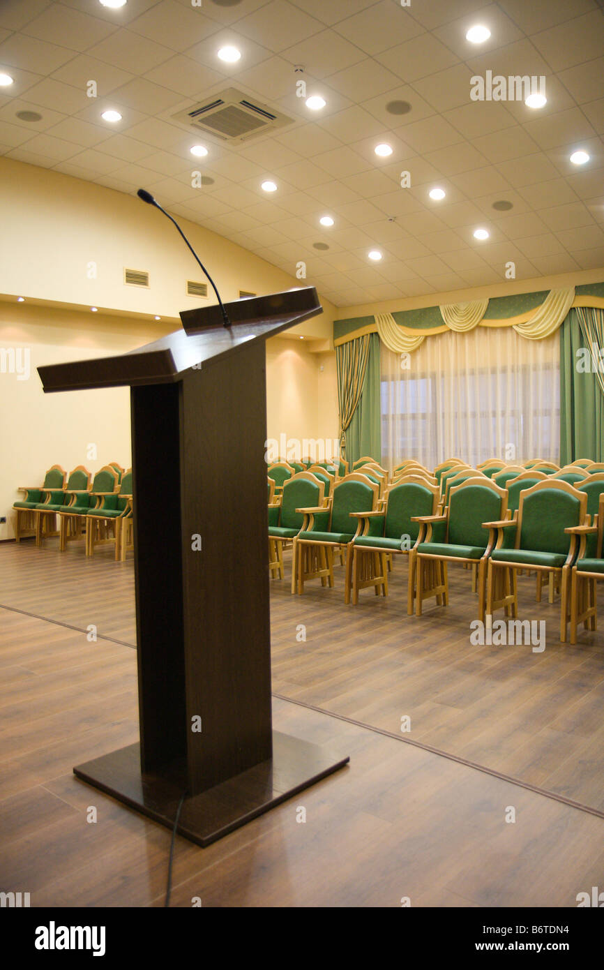 Modern auditorium hall for presentation with tribune Stock Photo - Alamy