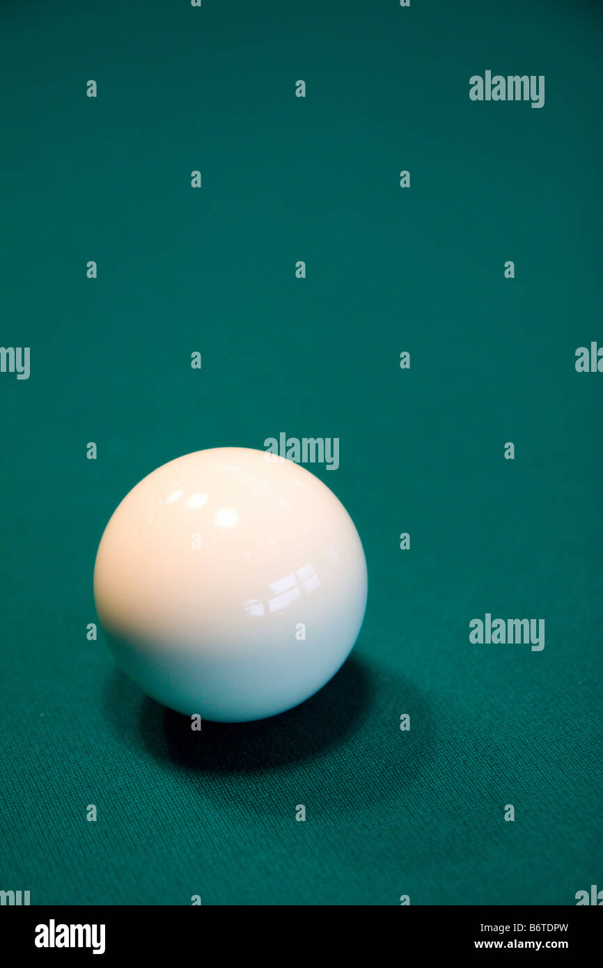 White billiard ball on a green table Stock Photo - Alamy
