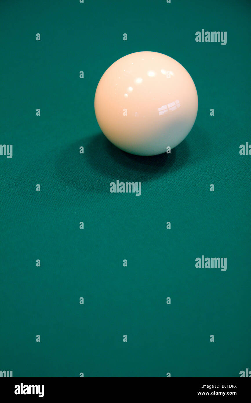 White billiard ball on a green table Stock Photo - Alamy
