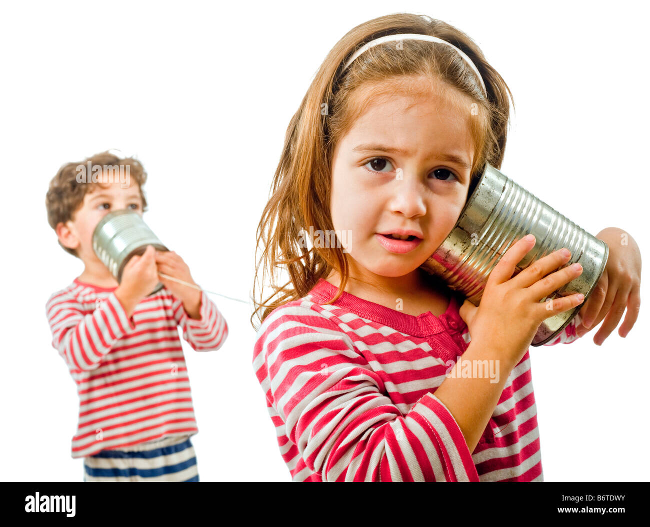 boy and girl talking on a tin phone isolated on white Stock Photo - Alamy