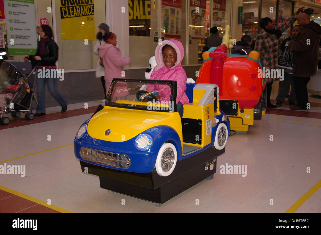 Childrens ride in Kingsland Shopping Centre, Dalston, London, England ...