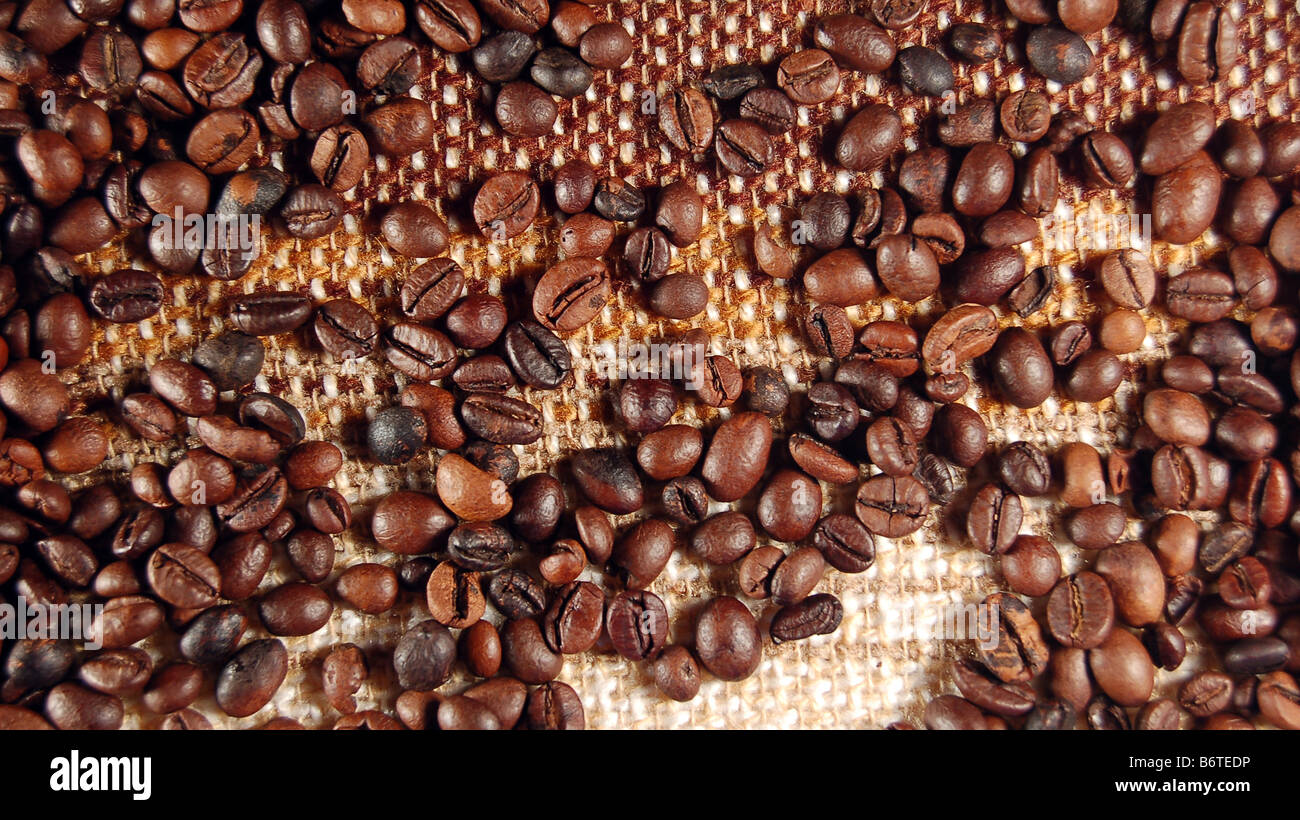 coffee beans on textile background Stock Photo - Alamy