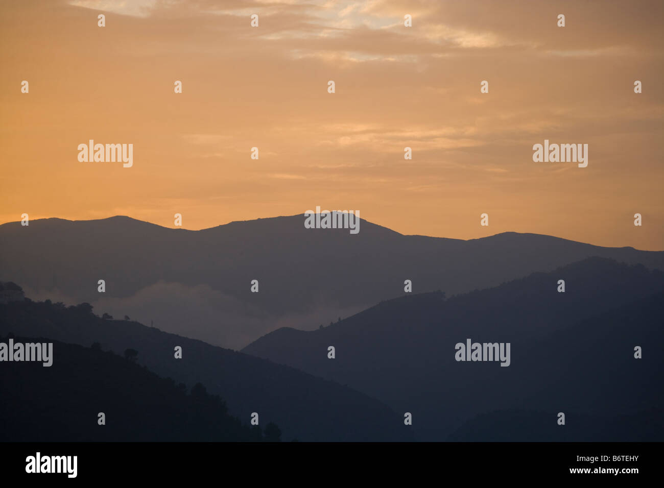Spanish mountain sunset Stock Photo - Alamy