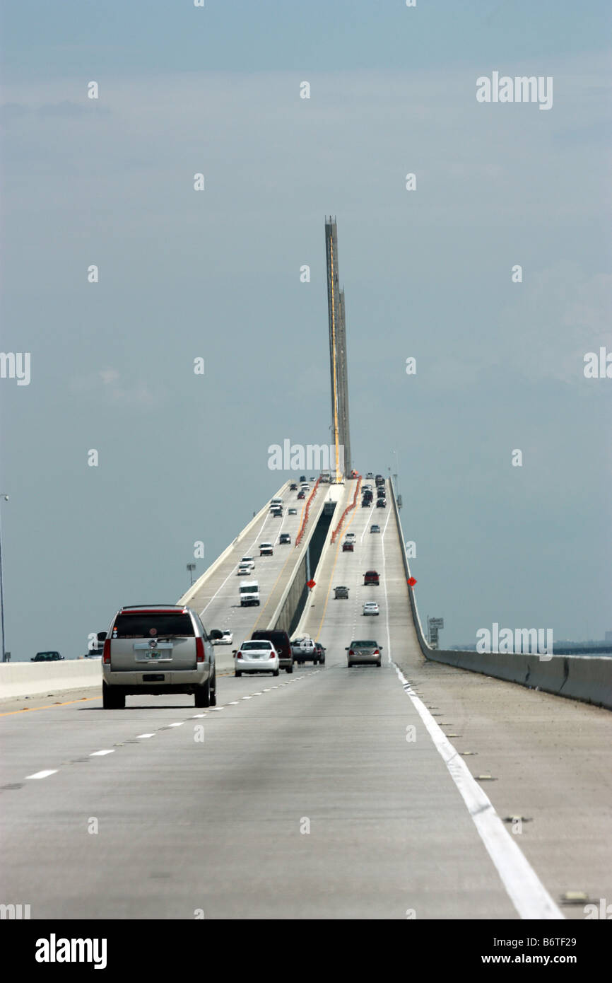 Cars Traveling On Modern Cable-Stayed Suspension Bridge Under Clear ...