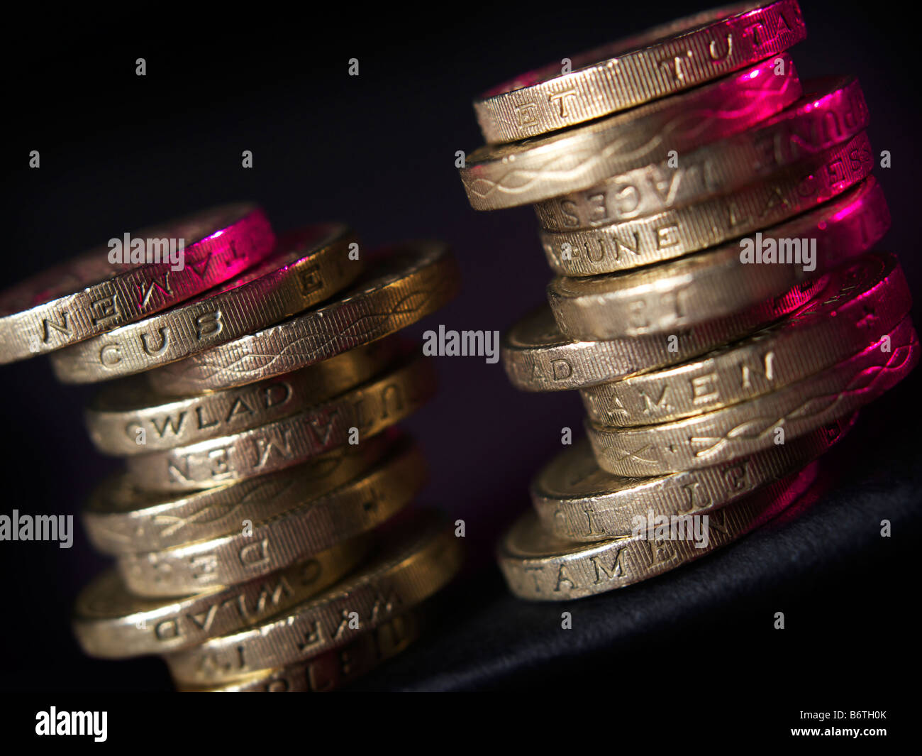 two stacks of pound coins Stock Photo - Alamy