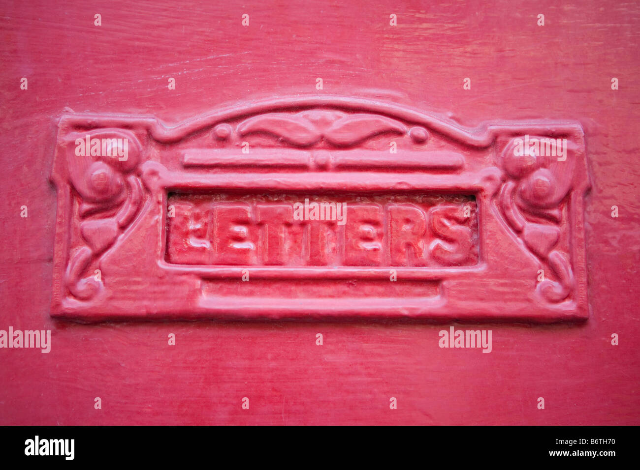 Close Up Of Red Letterbox In Wooden Door Stock Photo - Alamy