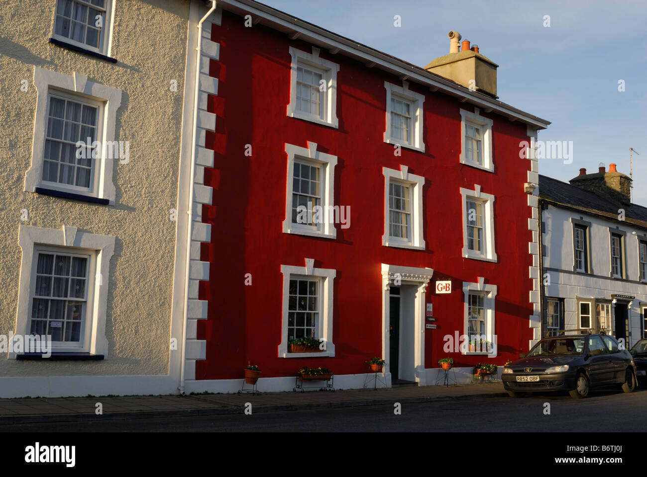 Red Georgian House in Aberaeron, Wales Stock Photo - Alamy