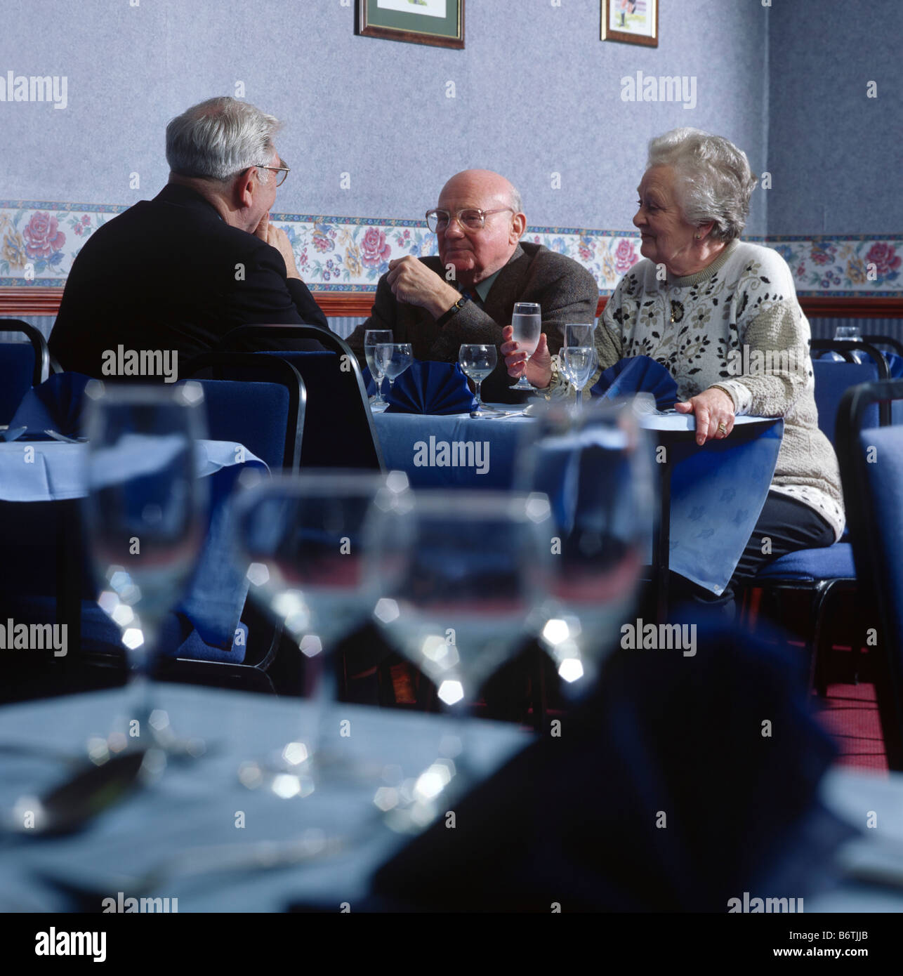 Diners at a Table Stock Photo - Alamy