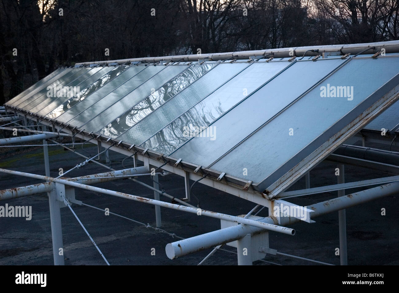 Solar panels reflection at sunset Stock Photo - Alamy