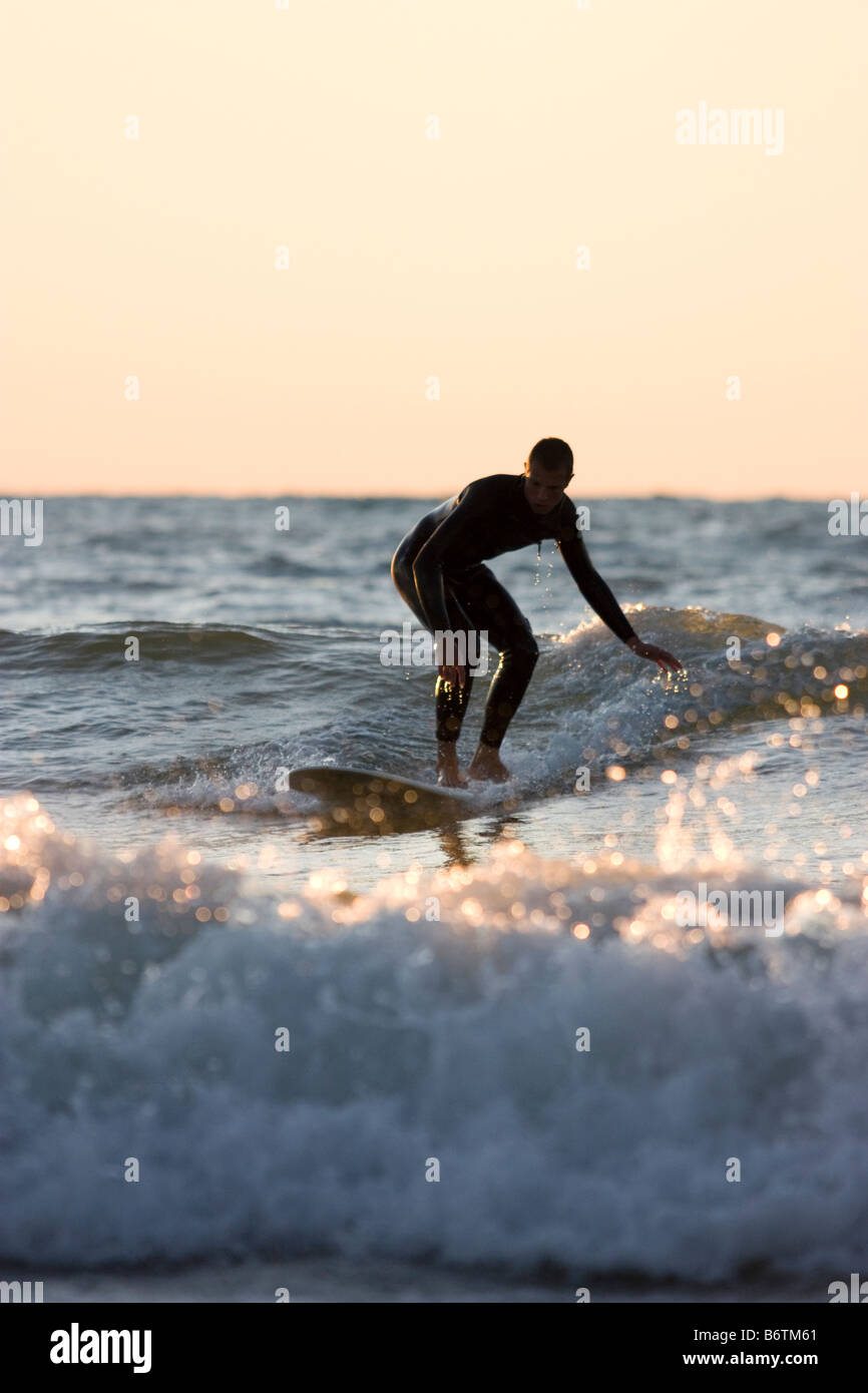 Balancing on surf board hi-res stock photography and images - Alamy