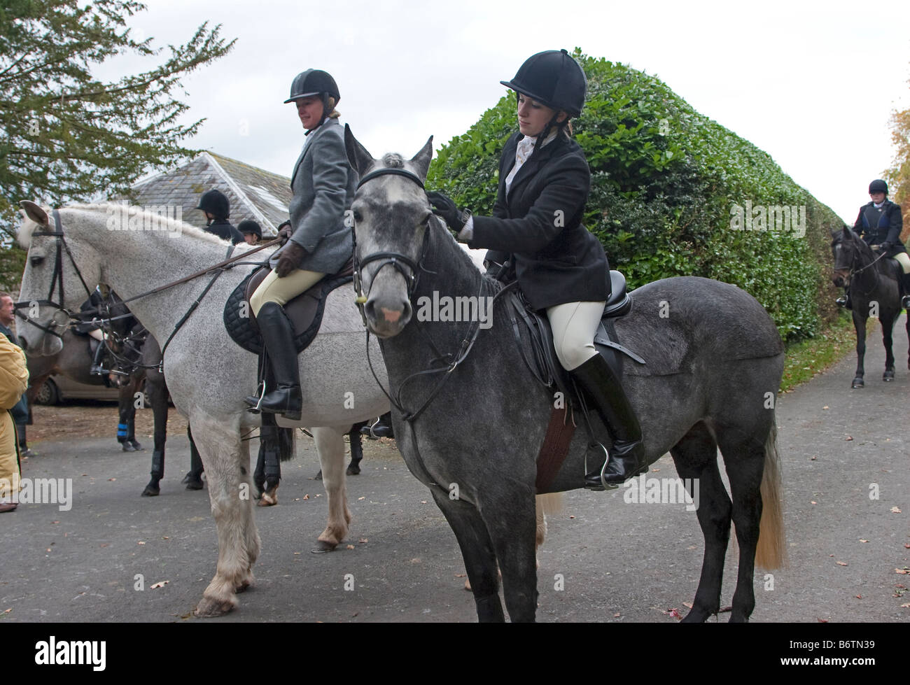 Two riders at a fox hunt meet Stock Photo - Alamy