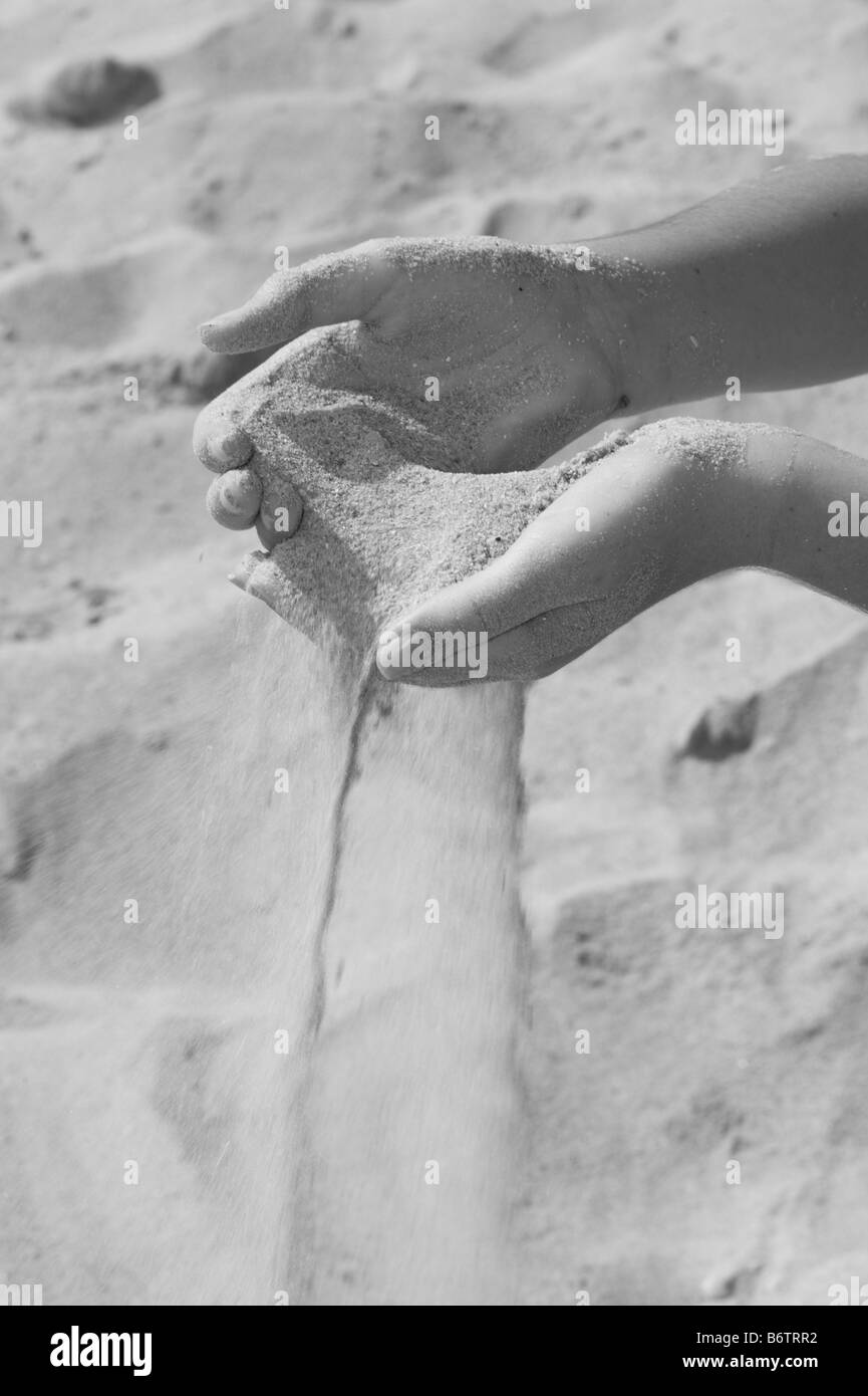 Fingers through sand Black and White Stock Photos & Images - Alamy