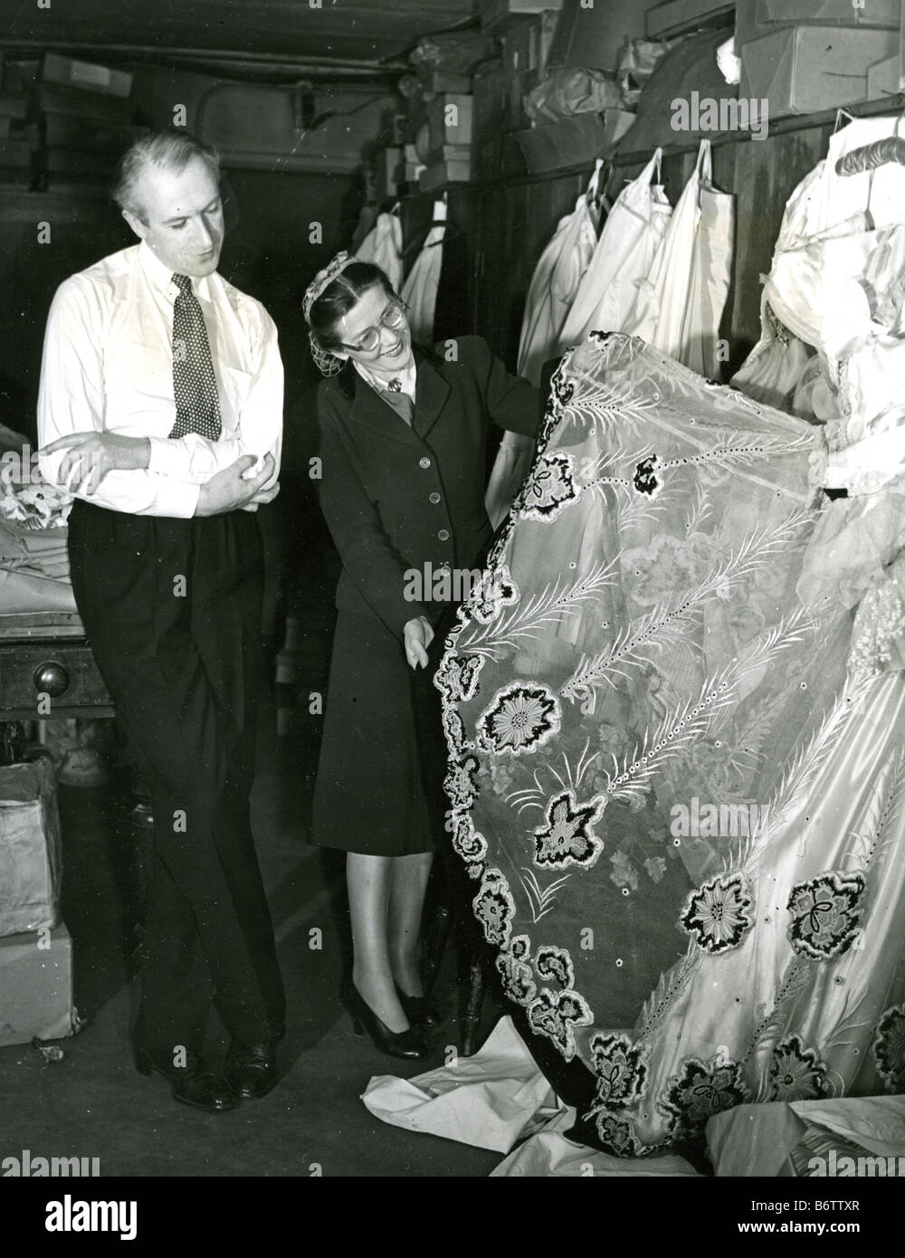 CECIL BEATON English fashion designer with his designs for a production ...