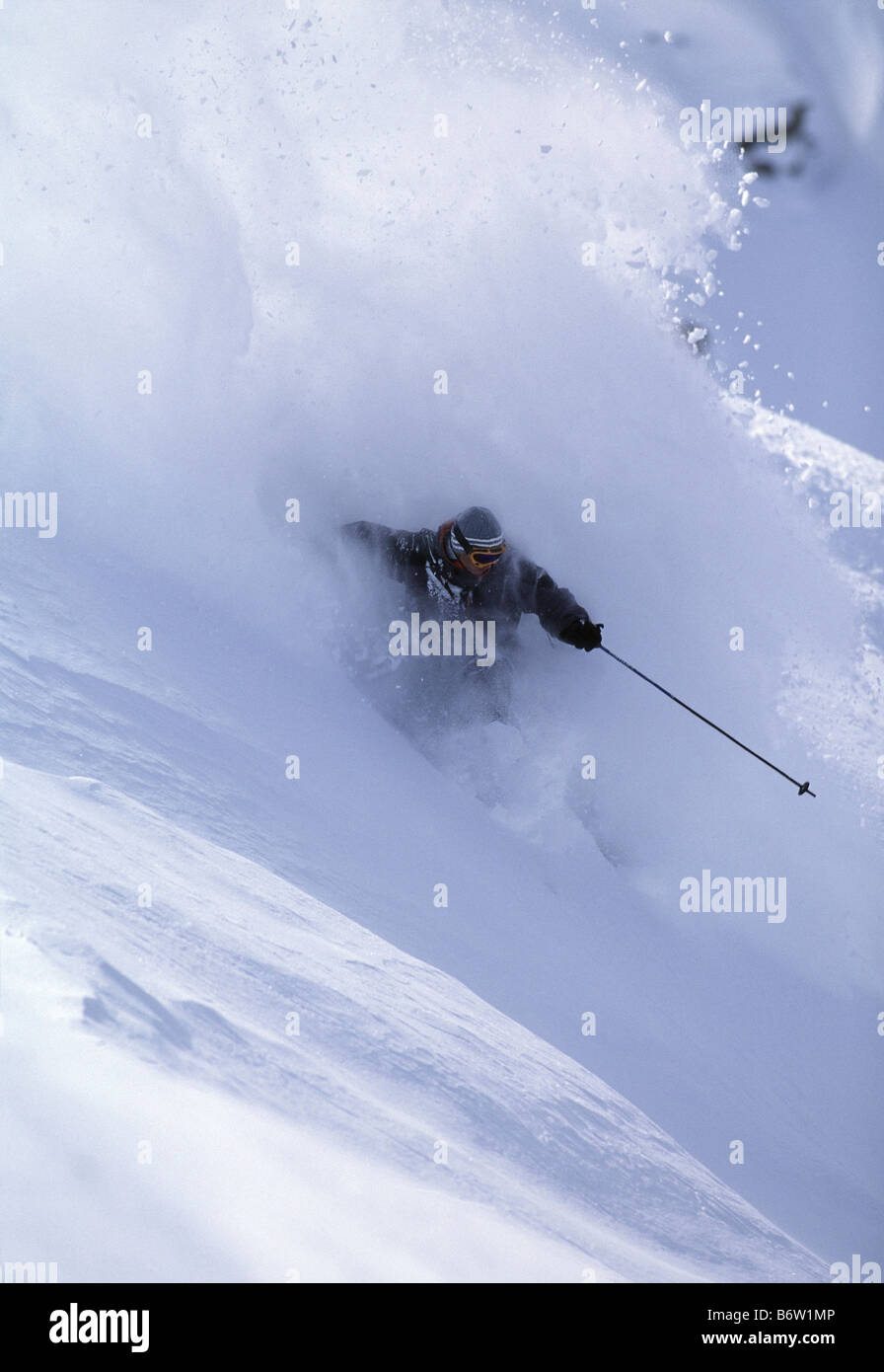 Skier Descending A Steep Slope High Resolution Stock Photography and ...