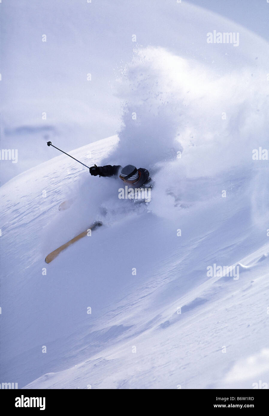 Skier Descending A Steep Slope High Resolution Stock Photography and ...