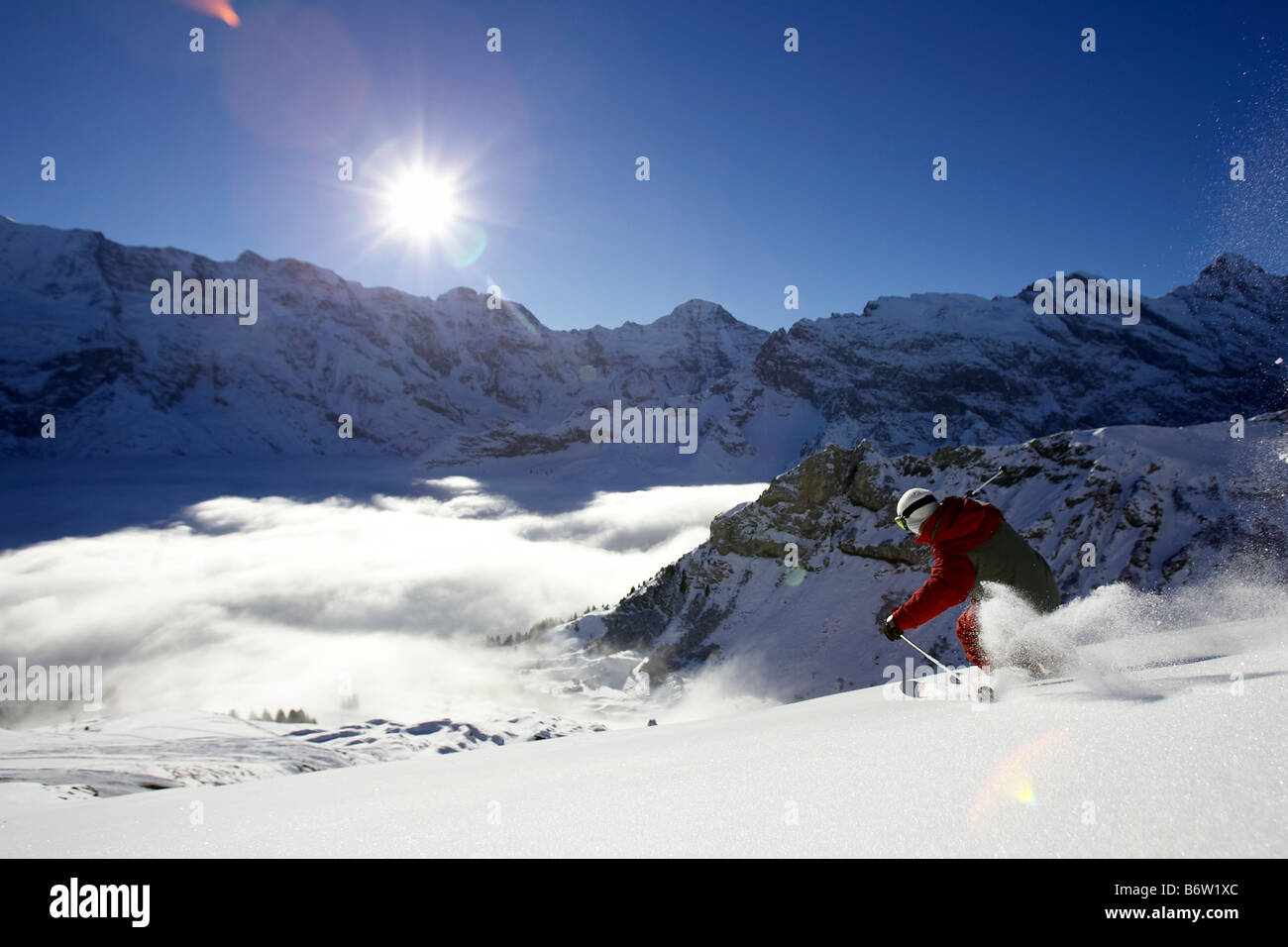 Skier turning in powder snow, Murren ski resort, Switzerland Stock ...