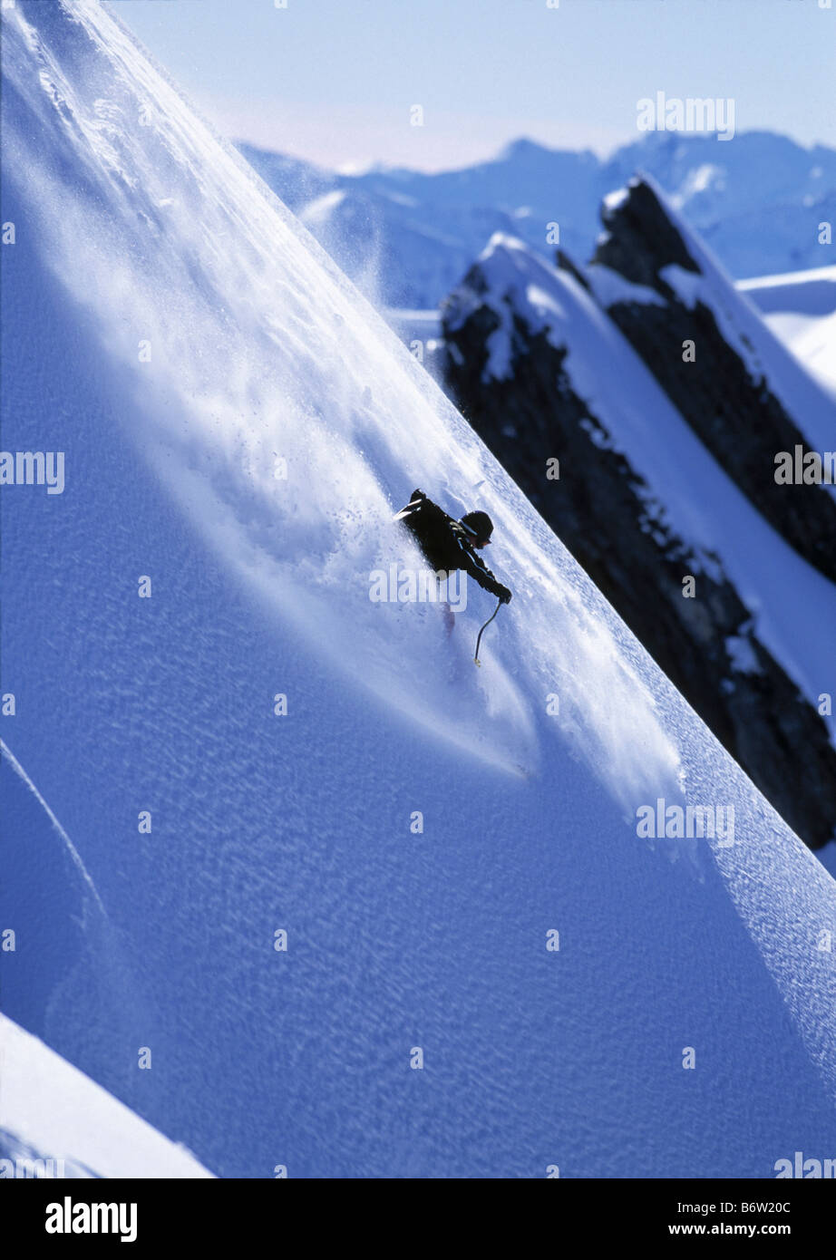 Skier Descending A Steep Slope High Resolution Stock Photography and ...