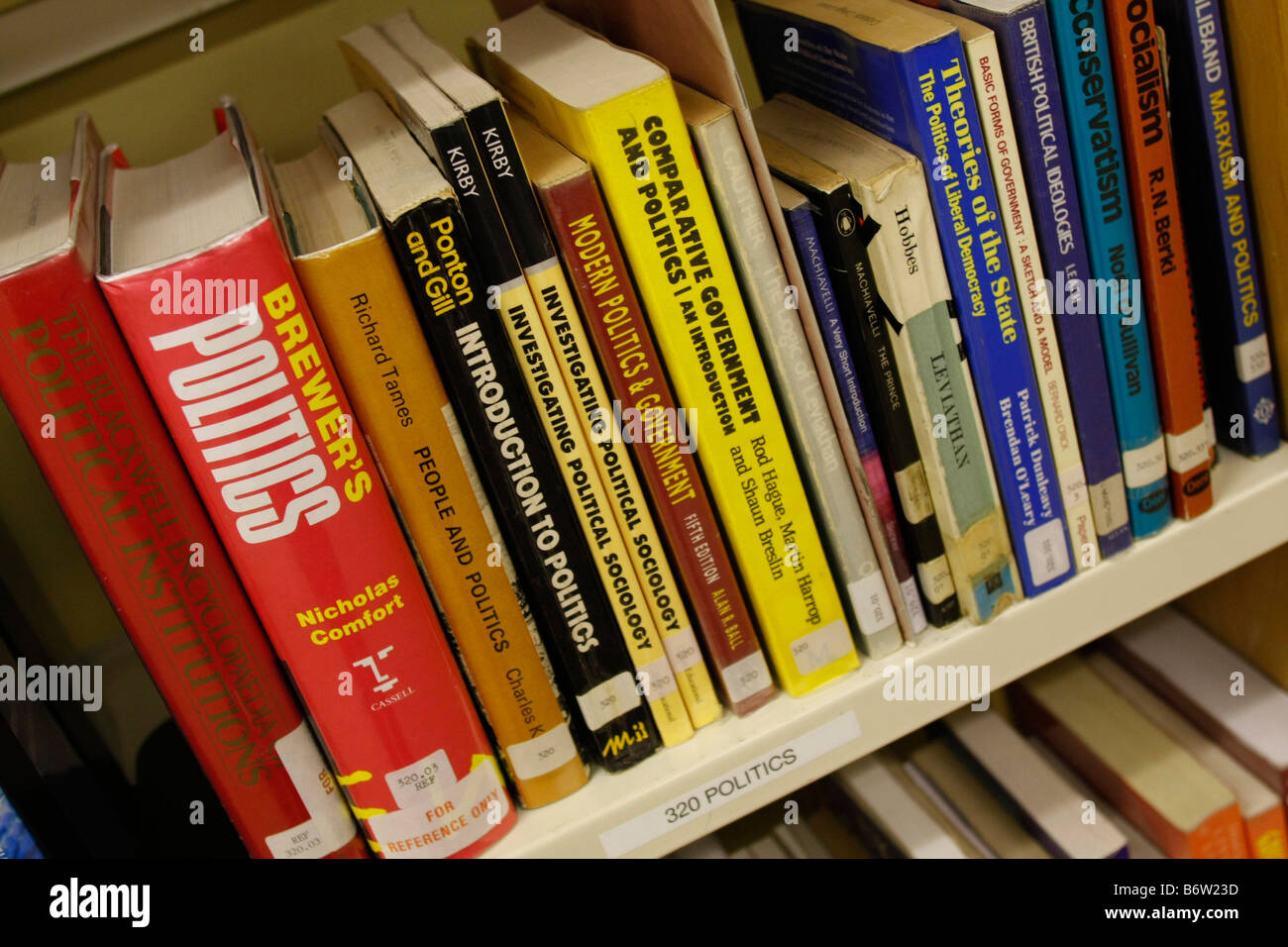 Politics Books on College library bookshelf Stock Photo - Alamy