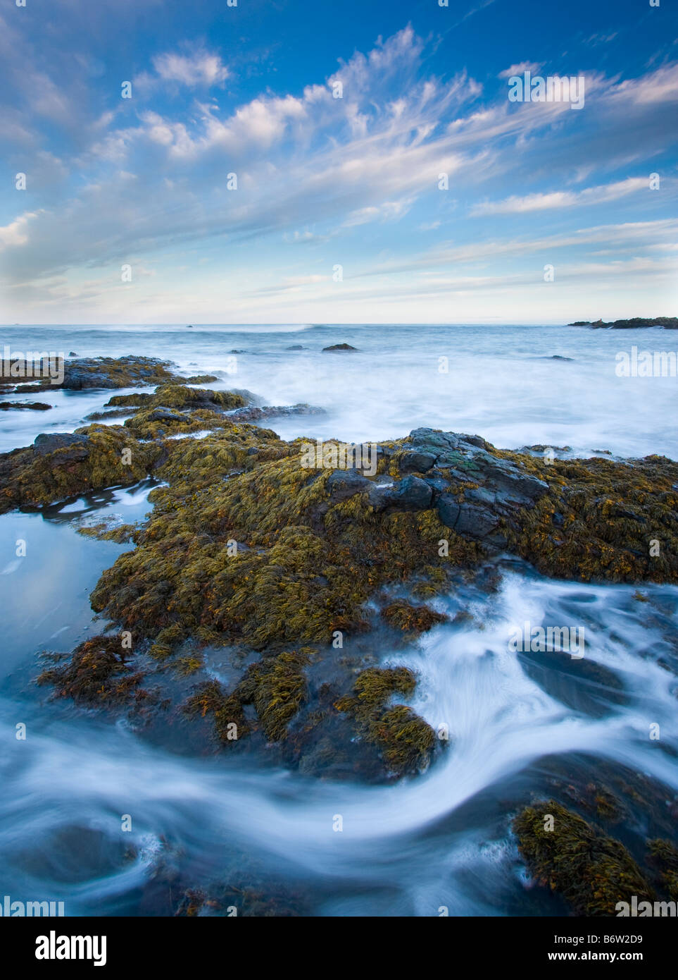 Cirrus clouds over the coast at Usan, Scotland Stock Photo - Alamy