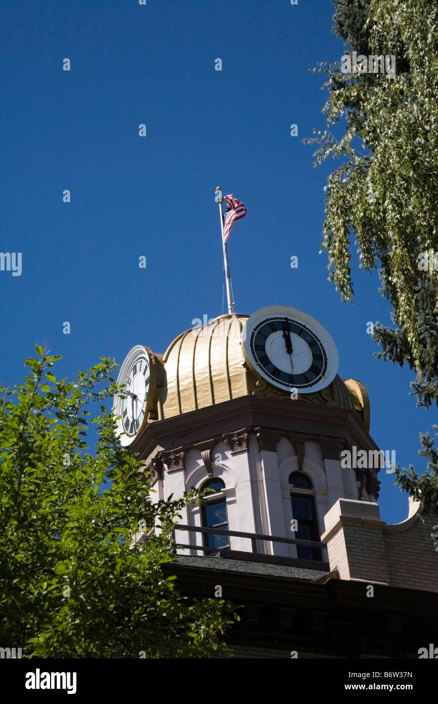 Fergus County golden domed Courthouse with two clocks showing different ...