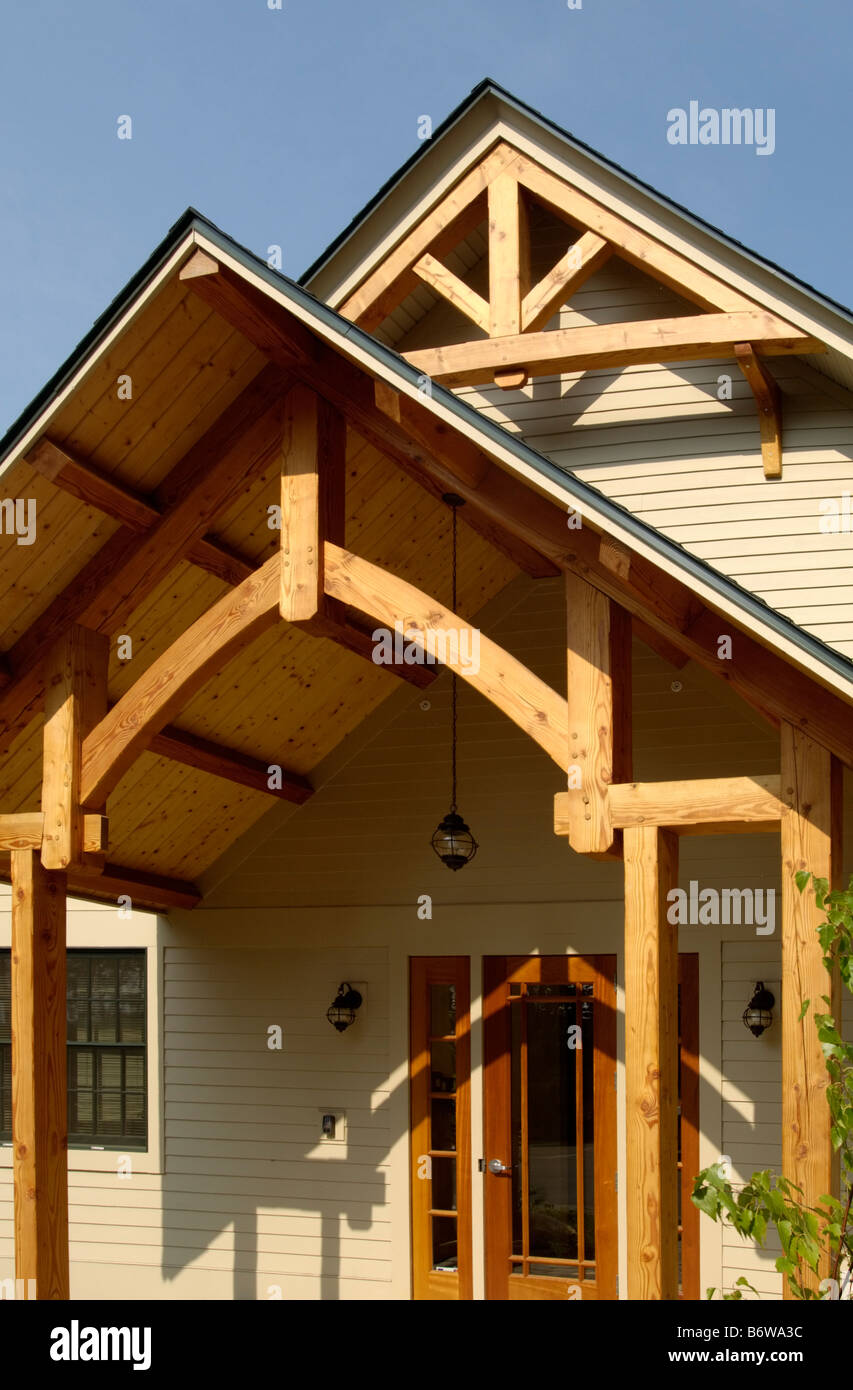 Home front entrance with wooden overhang Stock Photo - Alamy