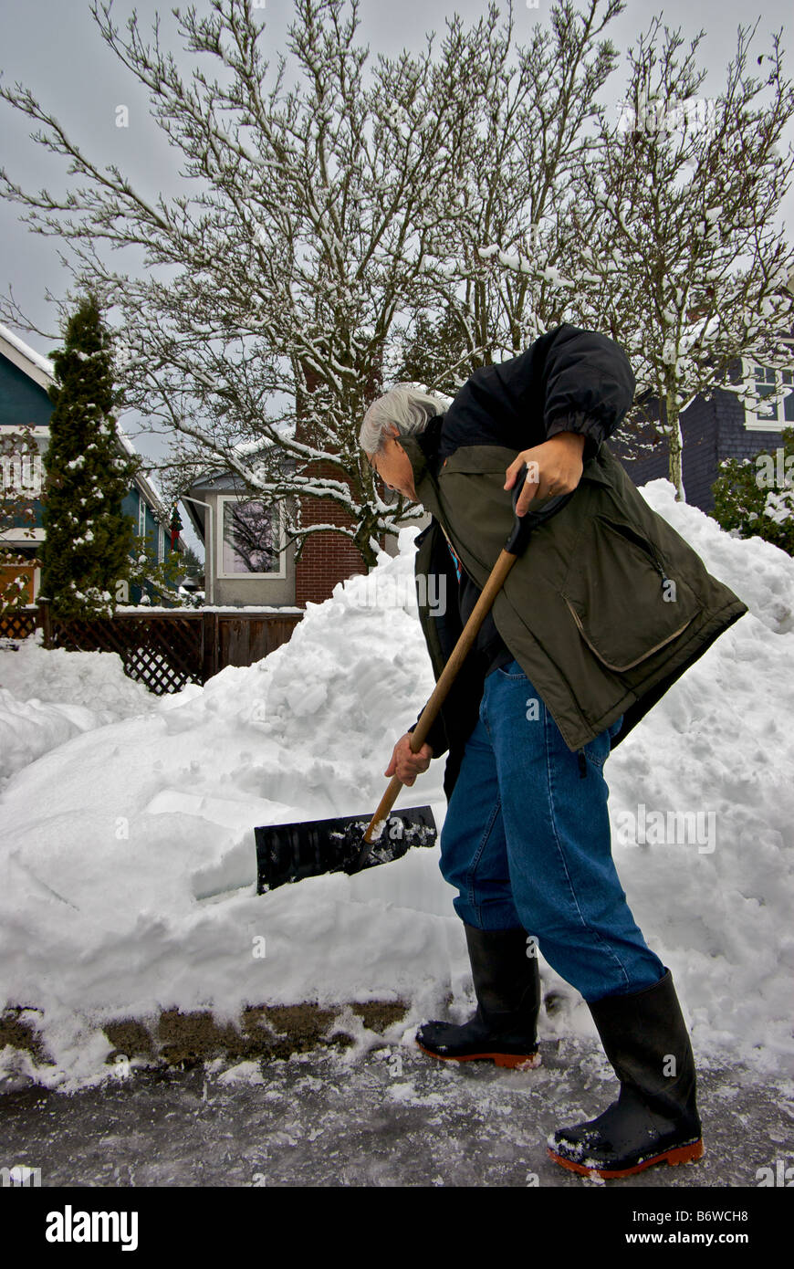 Old Man Shoveling Snow
