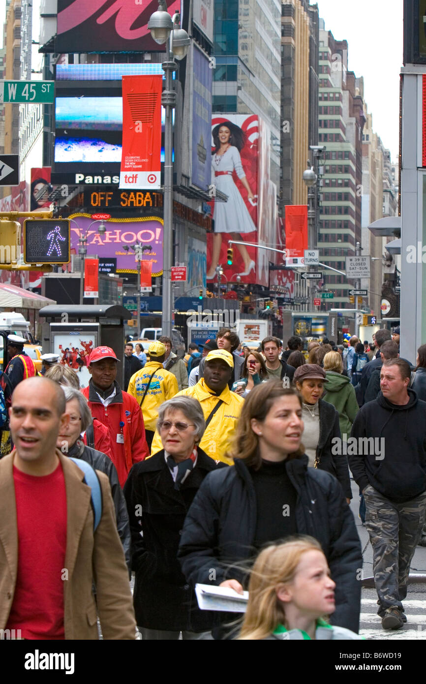 Pedestrians crossing the street in Times Square Manhattan New York City ...